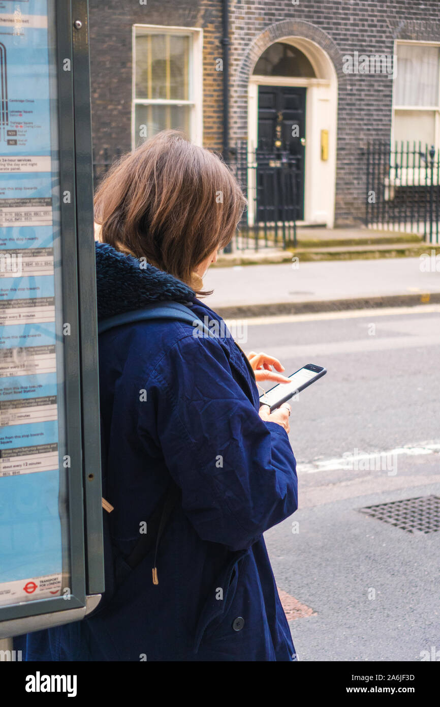 Bus stop poster and person hi-res stock photography and images - Alamy