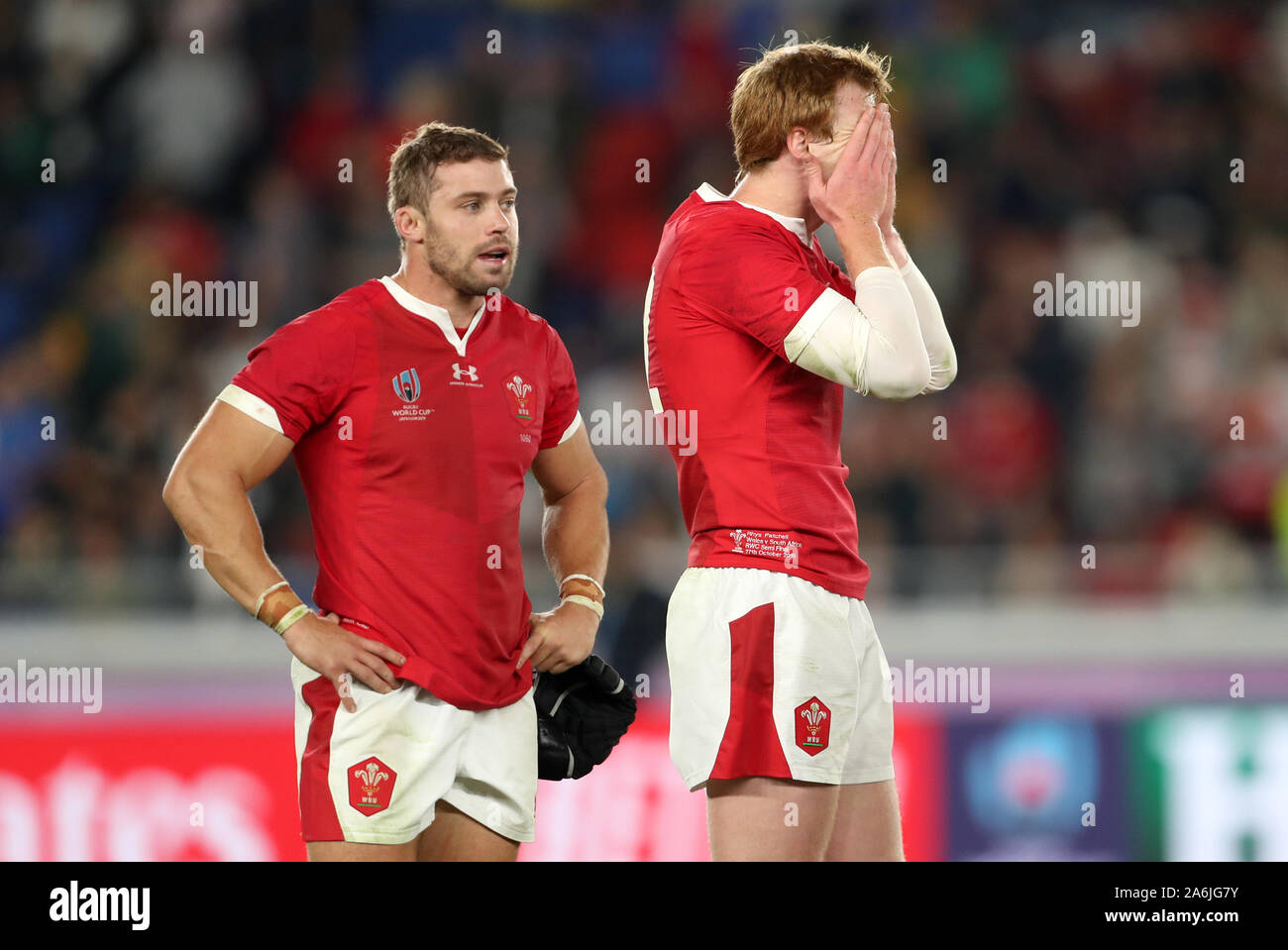 Wales' Rhys Patchell (right) appears dejected after the final whistle ...