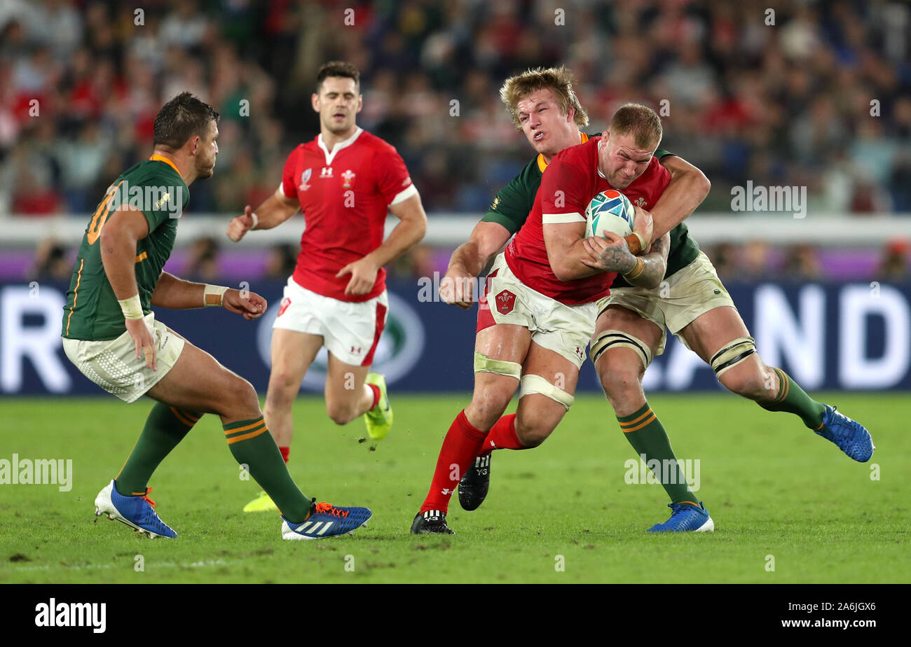 Wales' Ross Moriarty is tackled by South Africa's Pieter-Steph du Toit ...