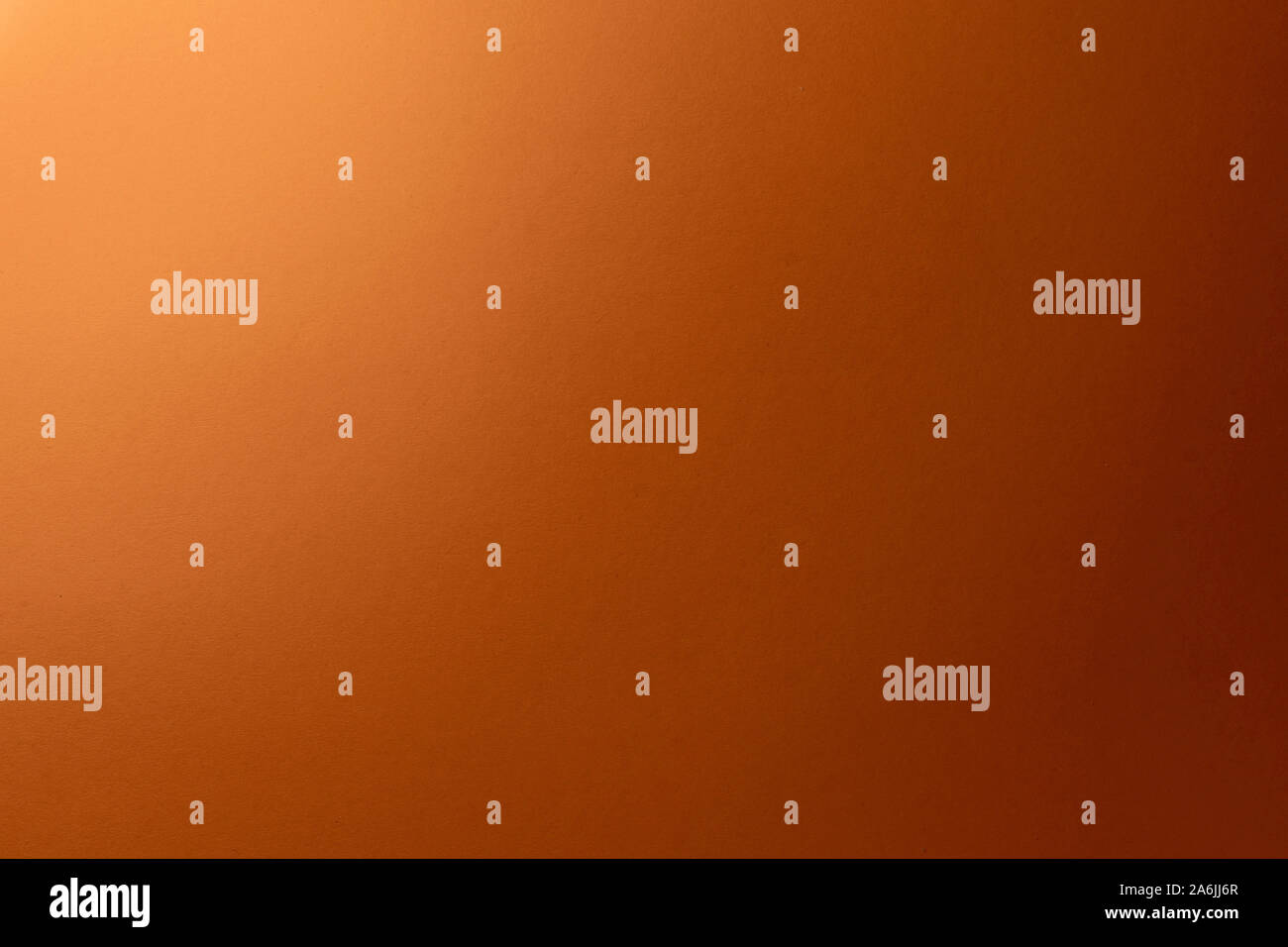 Gradient orange colored paper background Gradient light from candle ...