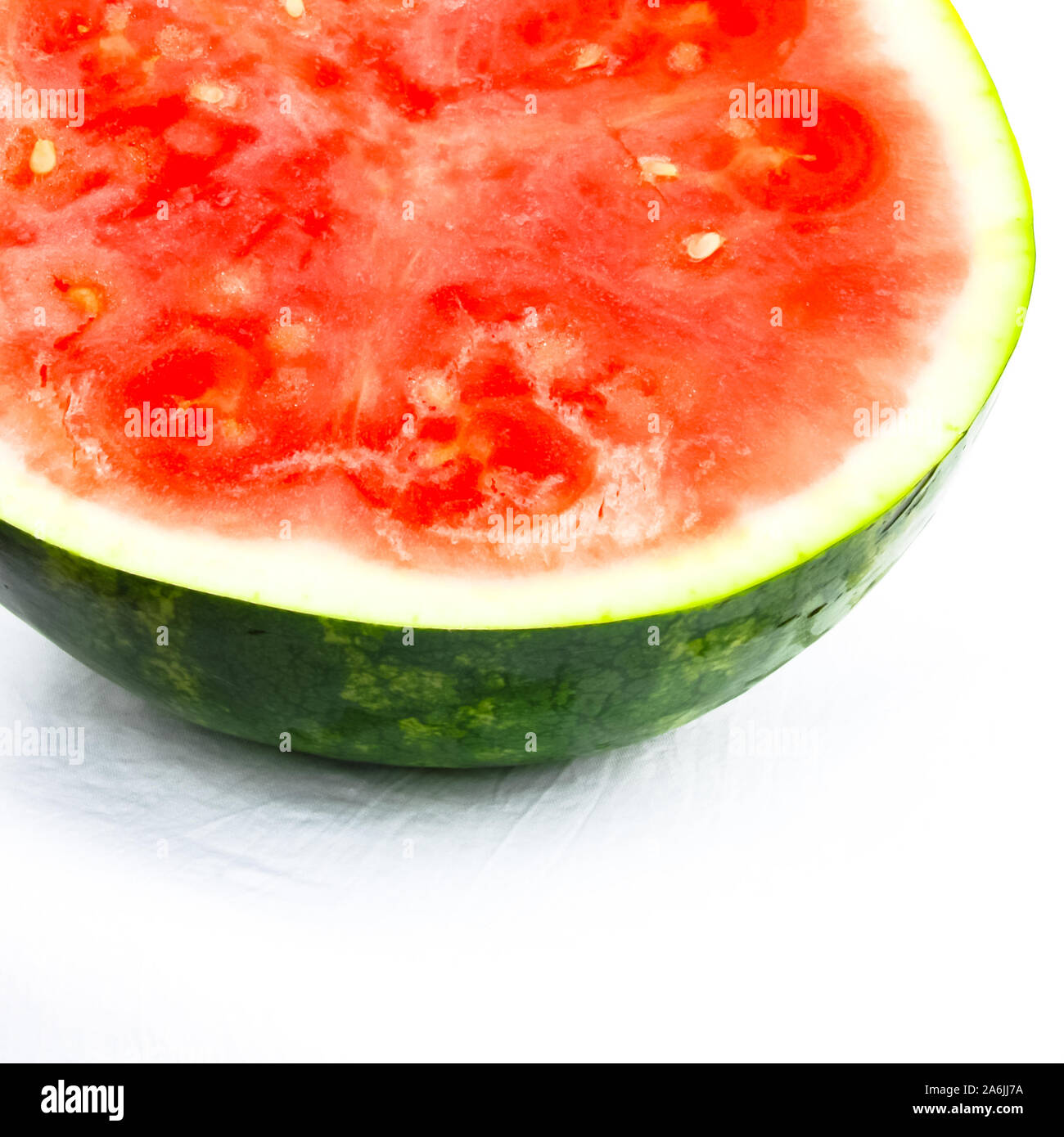 Studio shot half cut of organic watermelon isolated on white Stock ...
