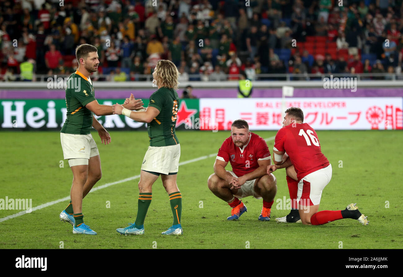 Wales' Dillon Lewis (left) and Elliot Dee appear dejected after the ...