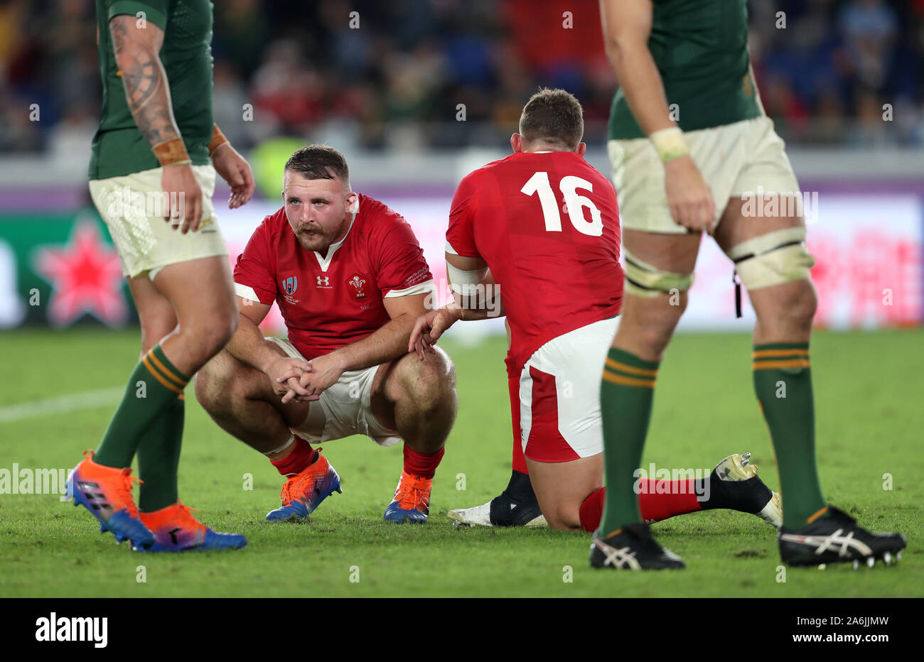 Wales' Dillon Lewis (left) and Elliot Dee appear dejected after the ...