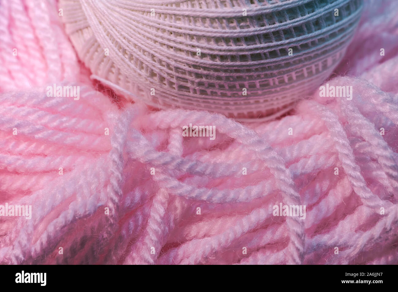 Close up beautiful tangle of thread in red and blue light background ...
