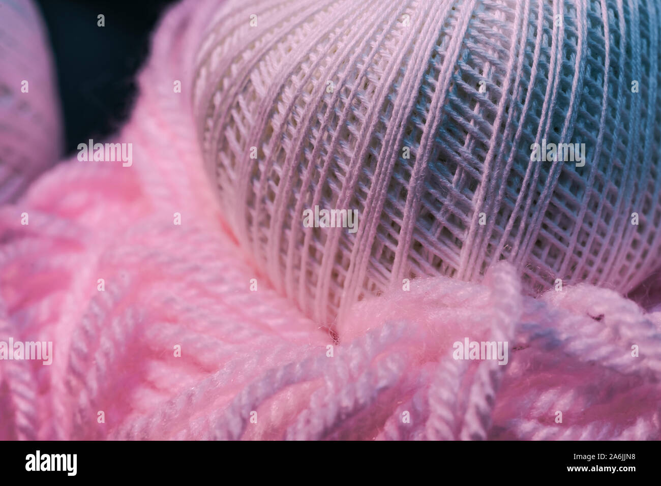 Close up beautiful tangle of thread in red and blue light background ...