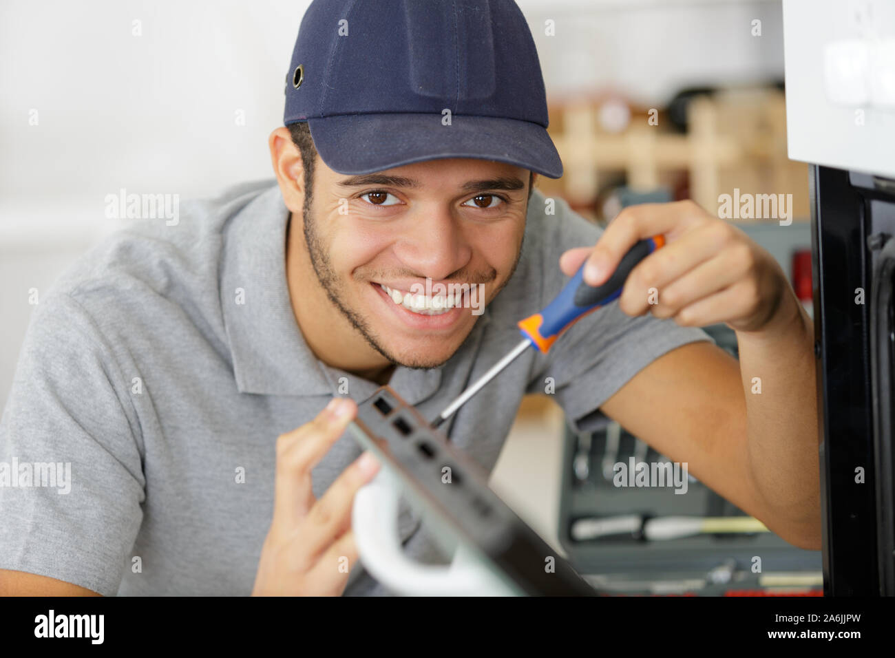 happy handy man home repair Stock Photo - Alamy