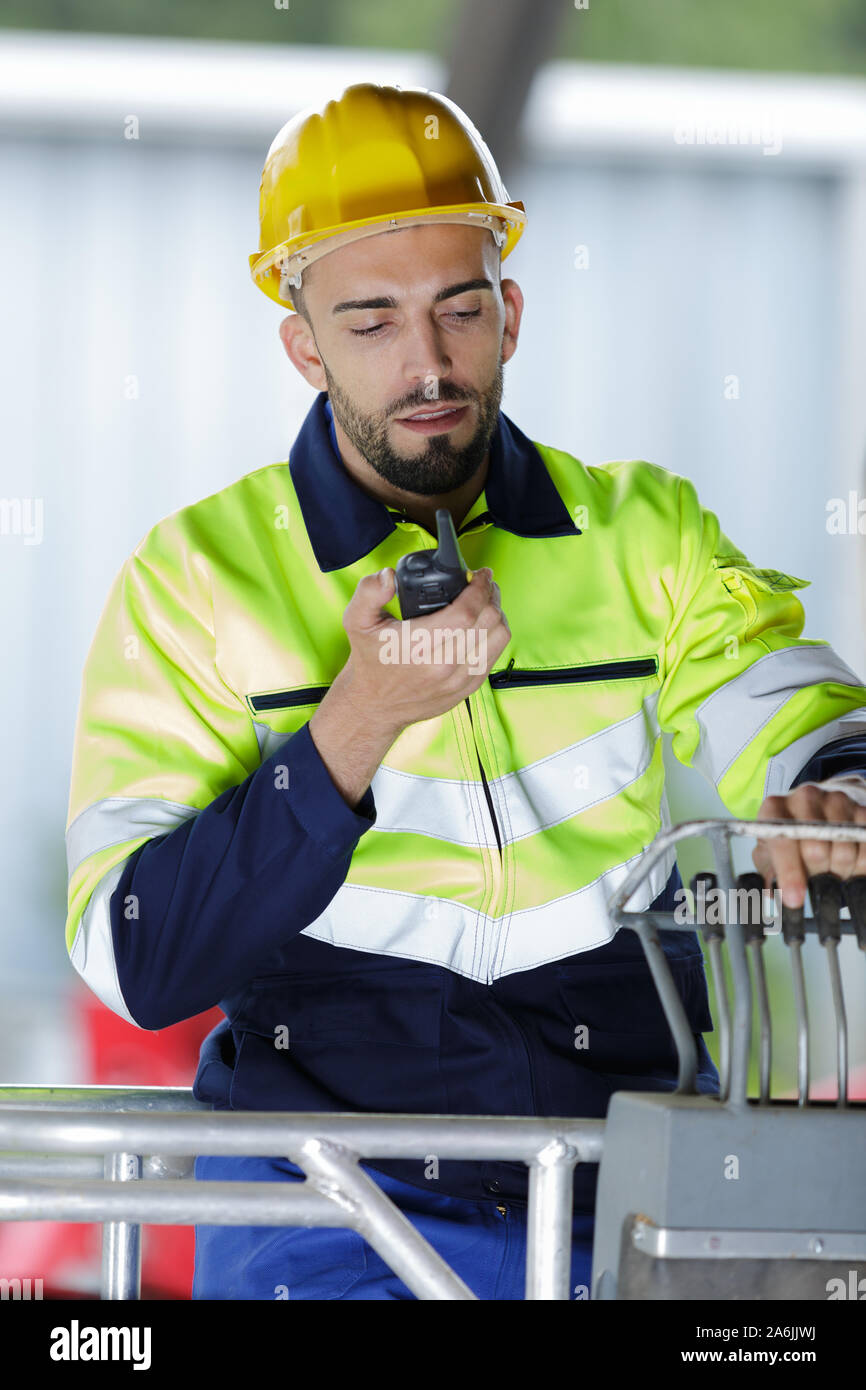 man with a walkie talkie Stock Photo - Alamy