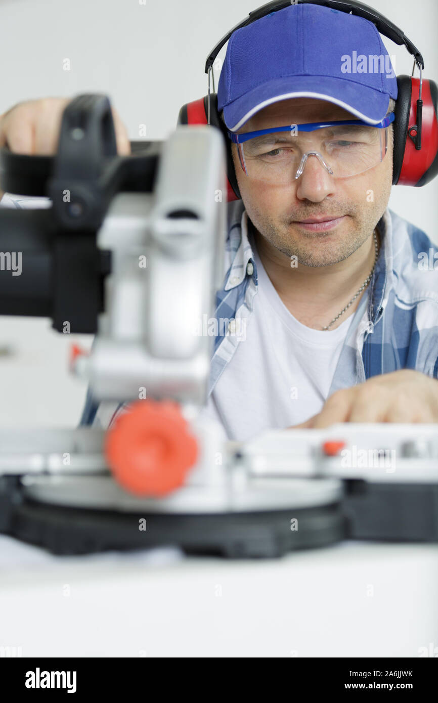 man using a circular saw Stock Photo - Alamy