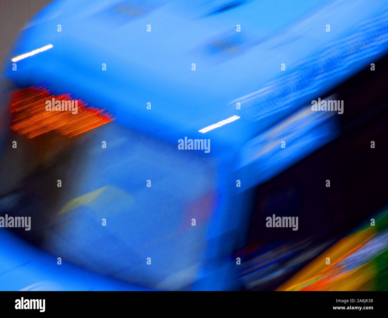 blurred and unfocused outline of a blue car. Abstraction Stock Photo ...