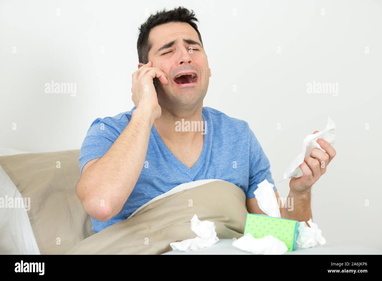 Man crying tissue hi-res stock photography and images - Alamy