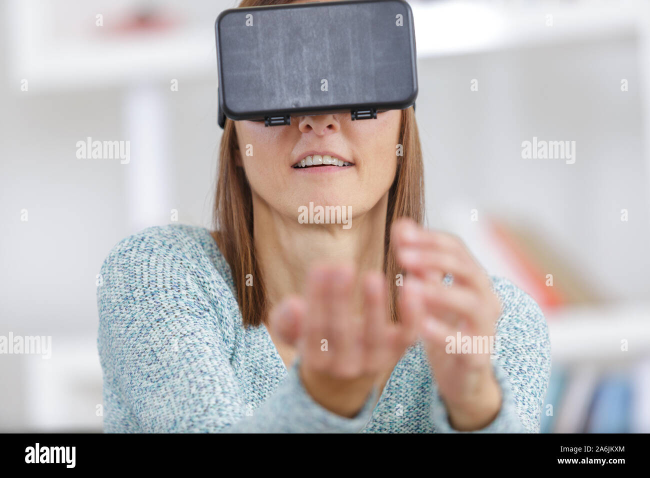 woman using a vr mask Stock Photo - Alamy
