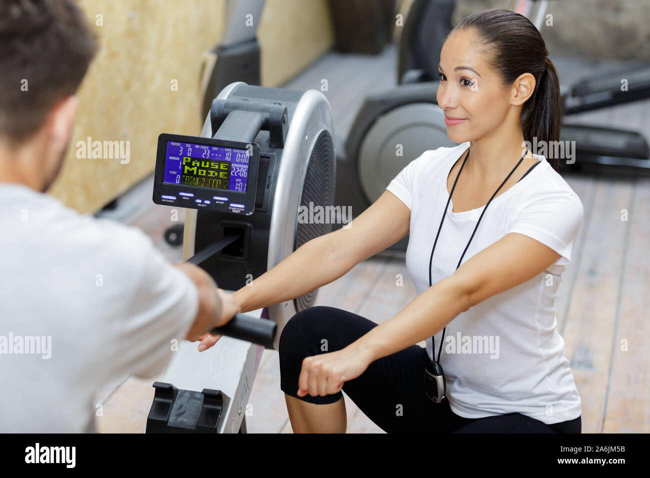 Man using rowing machine hi-res stock photography and images - Alamy