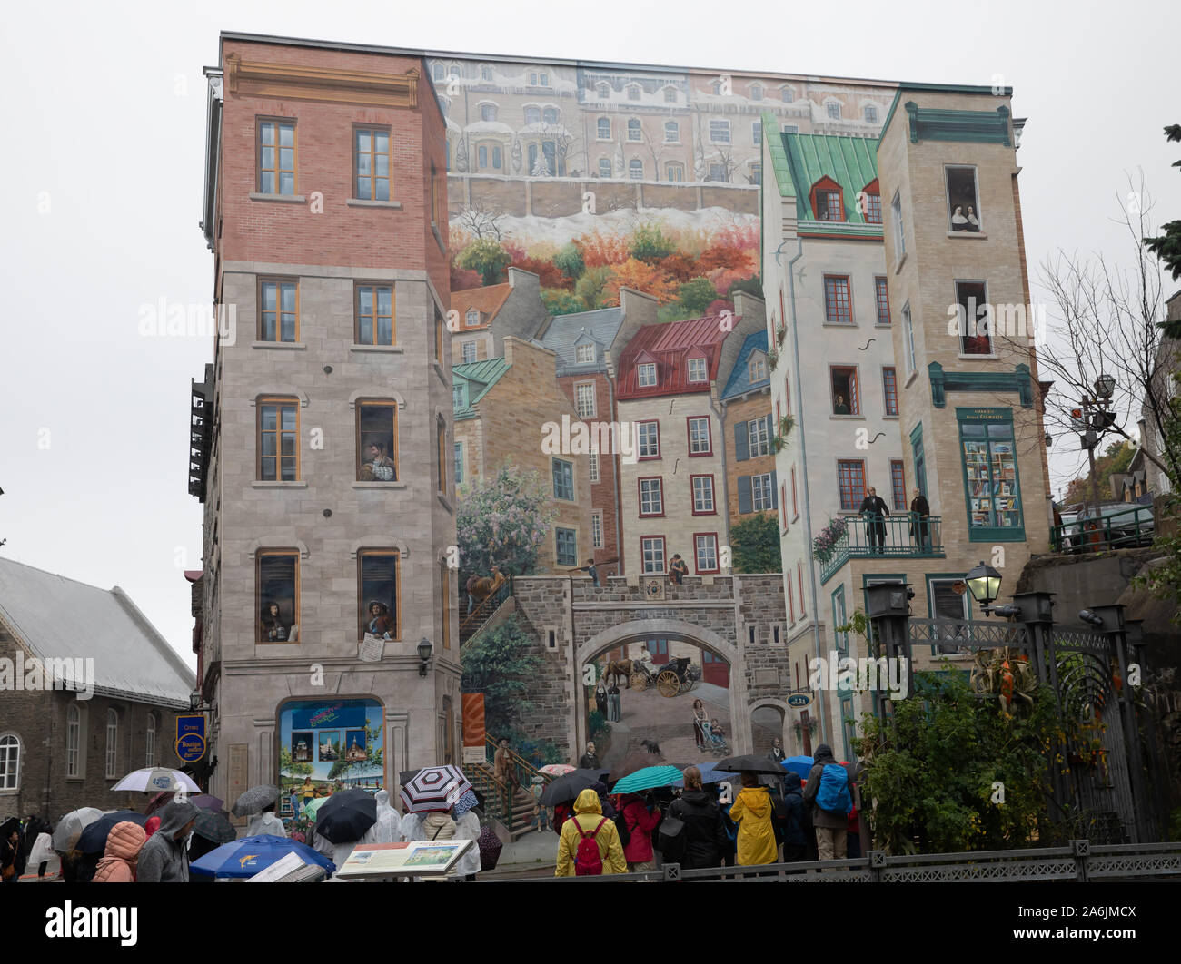 People admire The Eye Deceiving Mural of Quebec City, La Fresque des ...