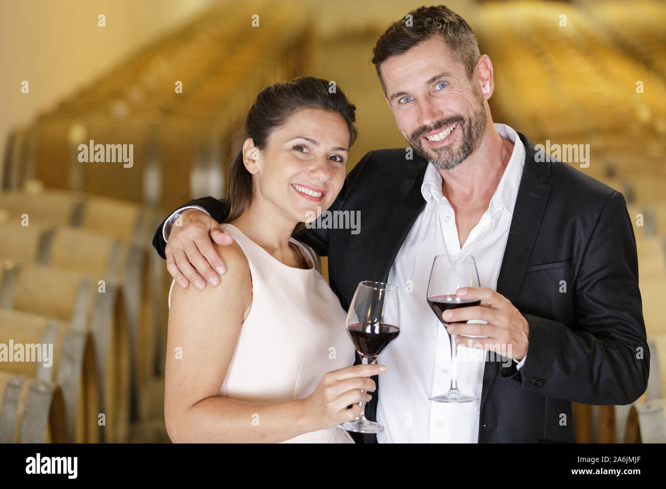 people tasting wine in cellar Stock Photo - Alamy