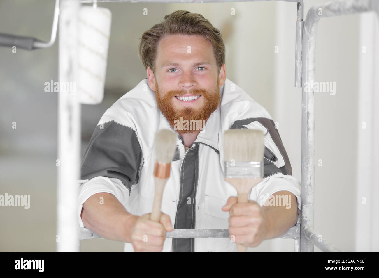 happy young man at work Stock Photo - Alamy