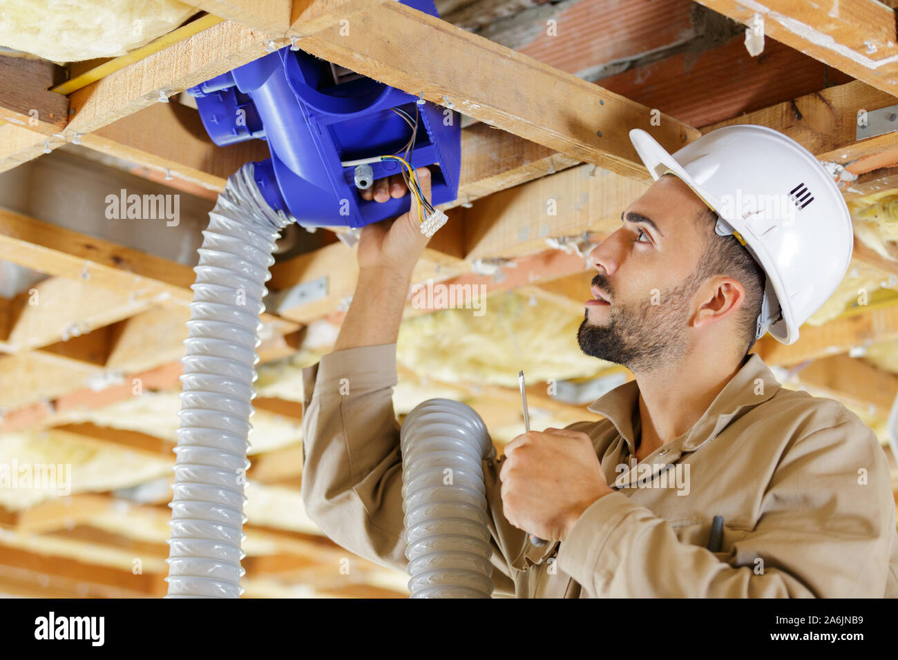 worker working on pipe structure Stock Photo - Alamy
