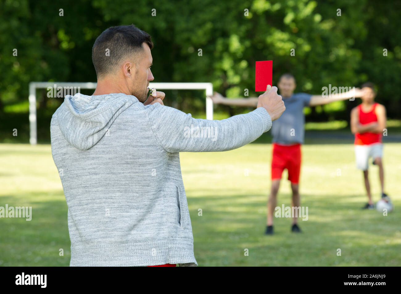 referee showing the red card in the soccer stadium Stock Photo - Alamy