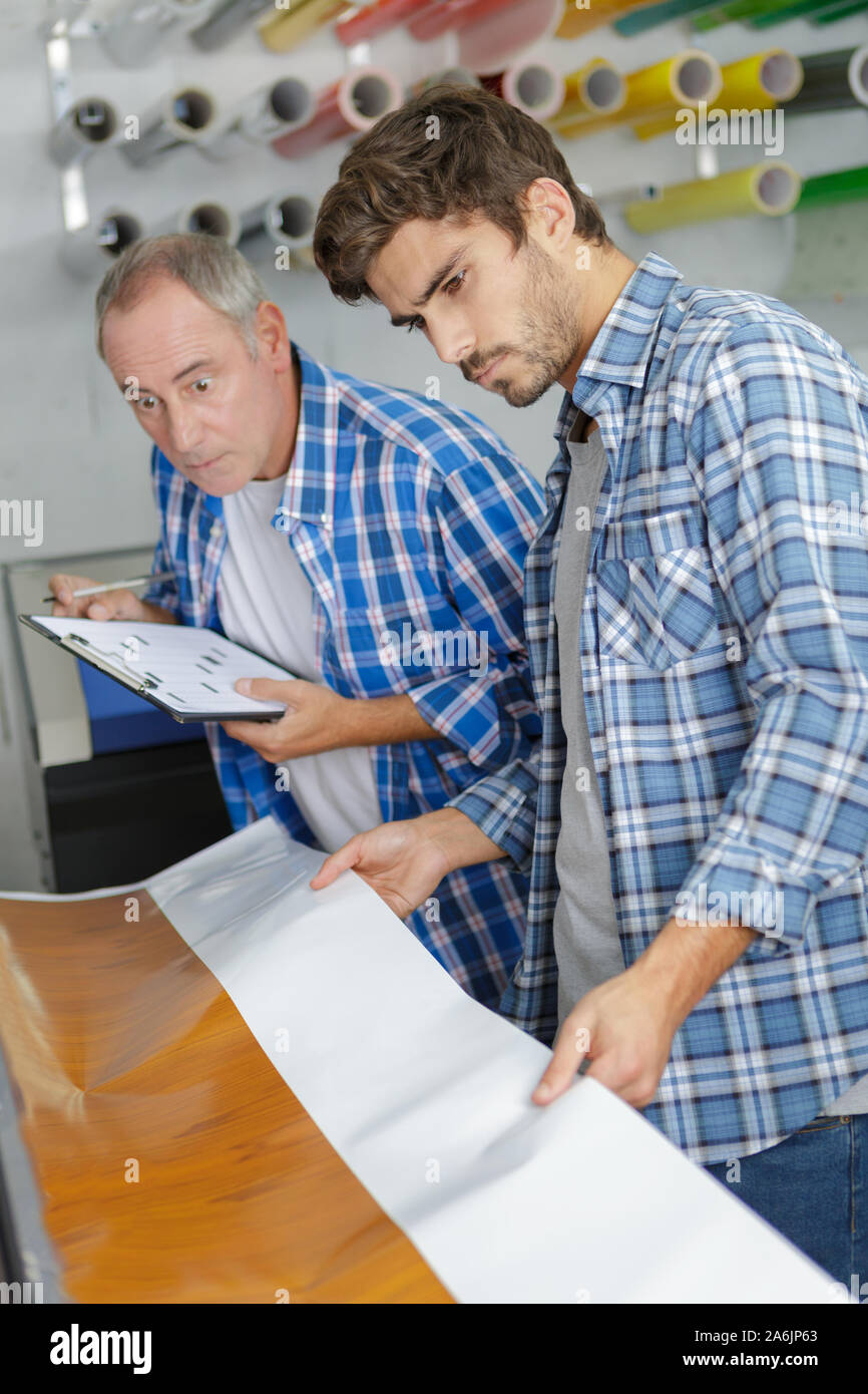 Printing operator working manufacturing hi-res stock photography and ...