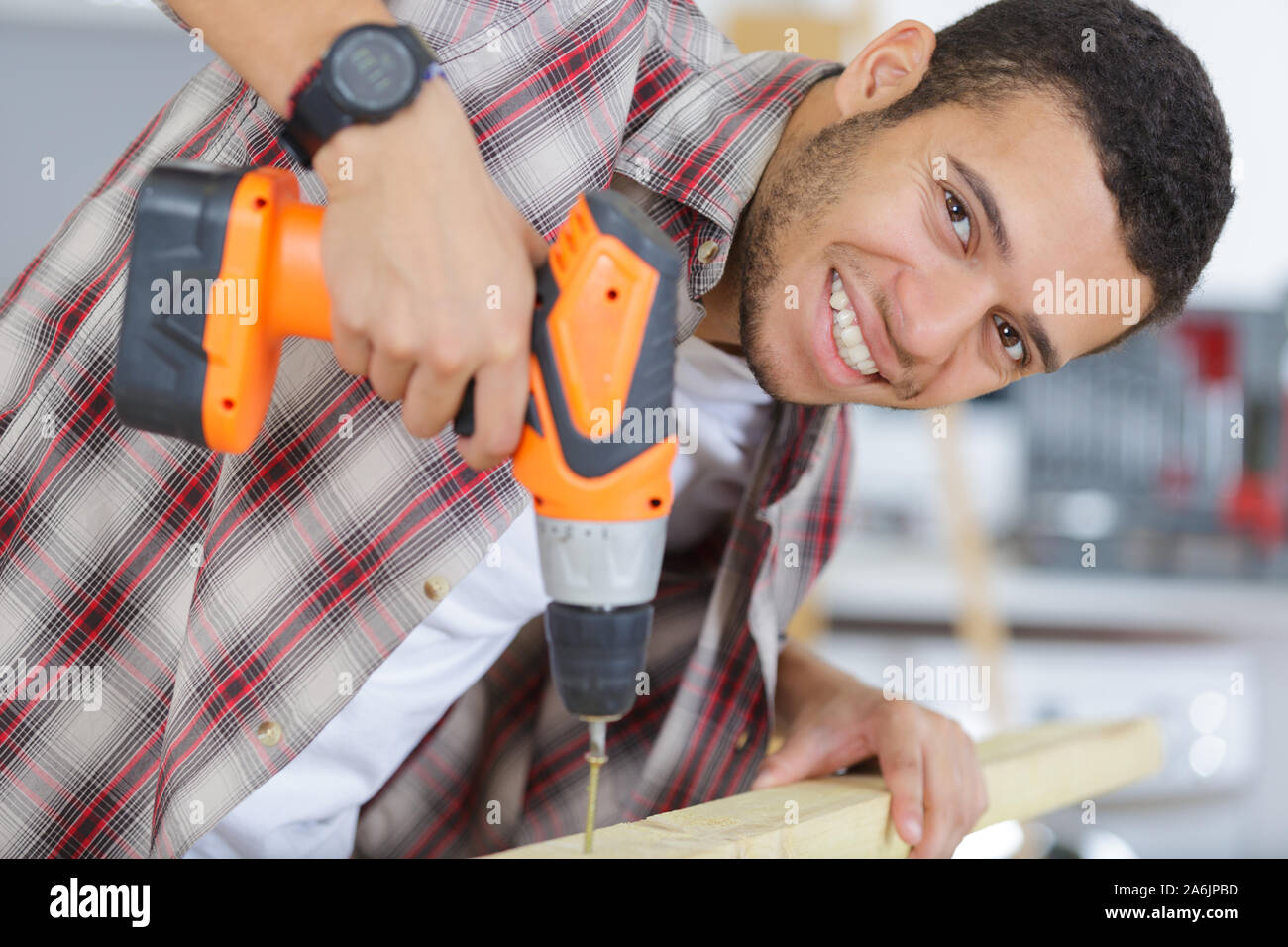 Handsome carpenter working timber hi-res stock photography and images ...
