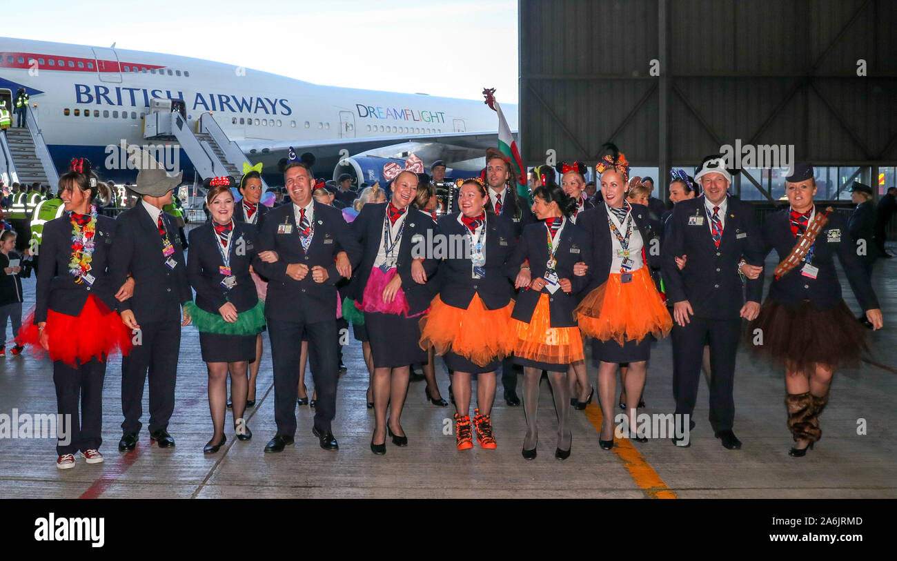 British Airways crew, before boarding to look after children from all ...