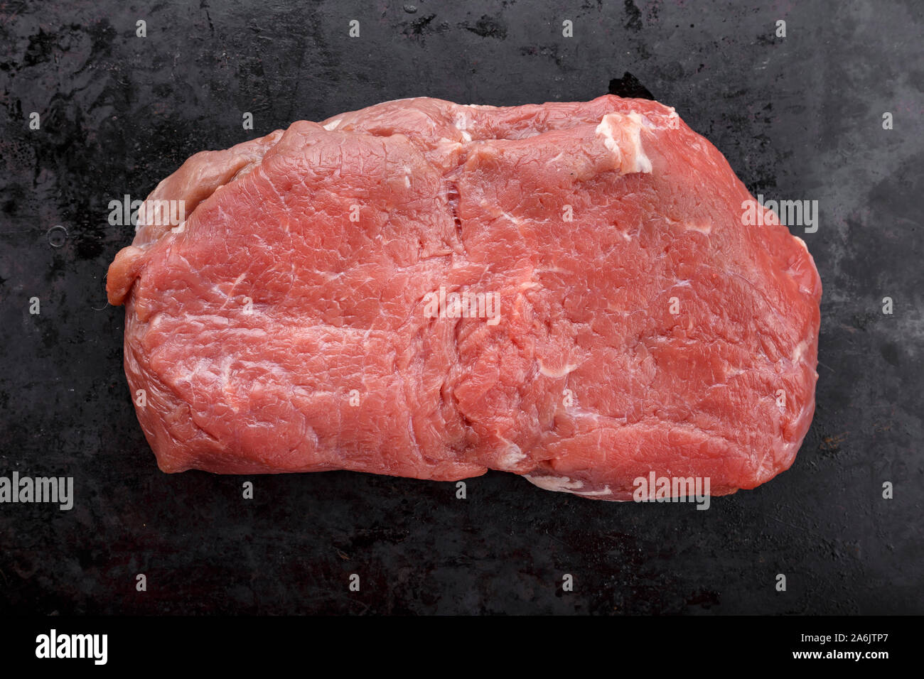 raw steak on the table. view from above. place for text Stock Photo - Alamy