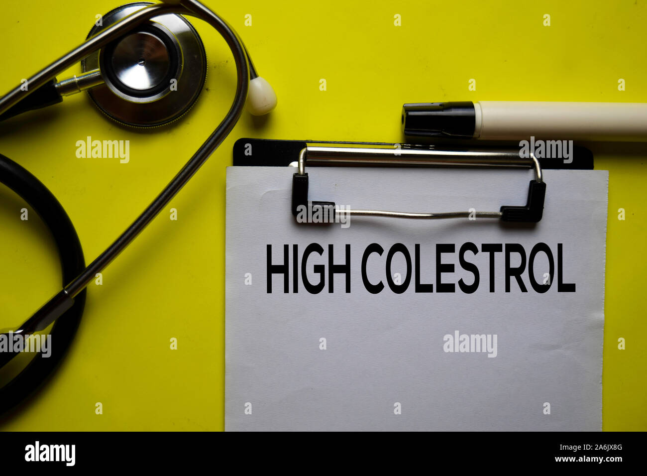 High Colesterol on the sticky notes with Yellow background. Healthcare ...