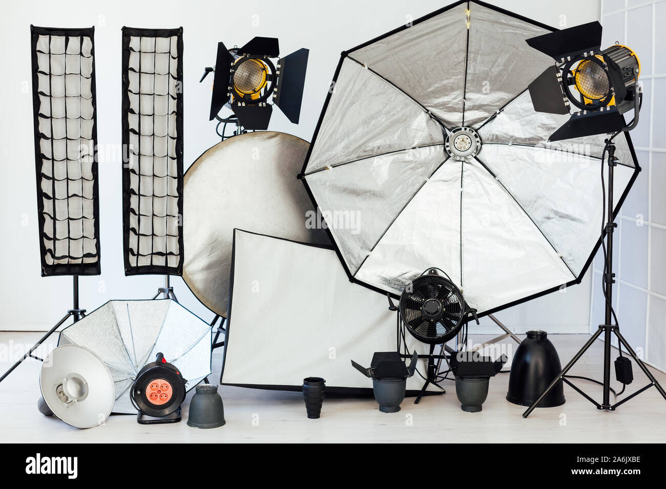 Photo studio equipment flash accessories photographer on a white ...