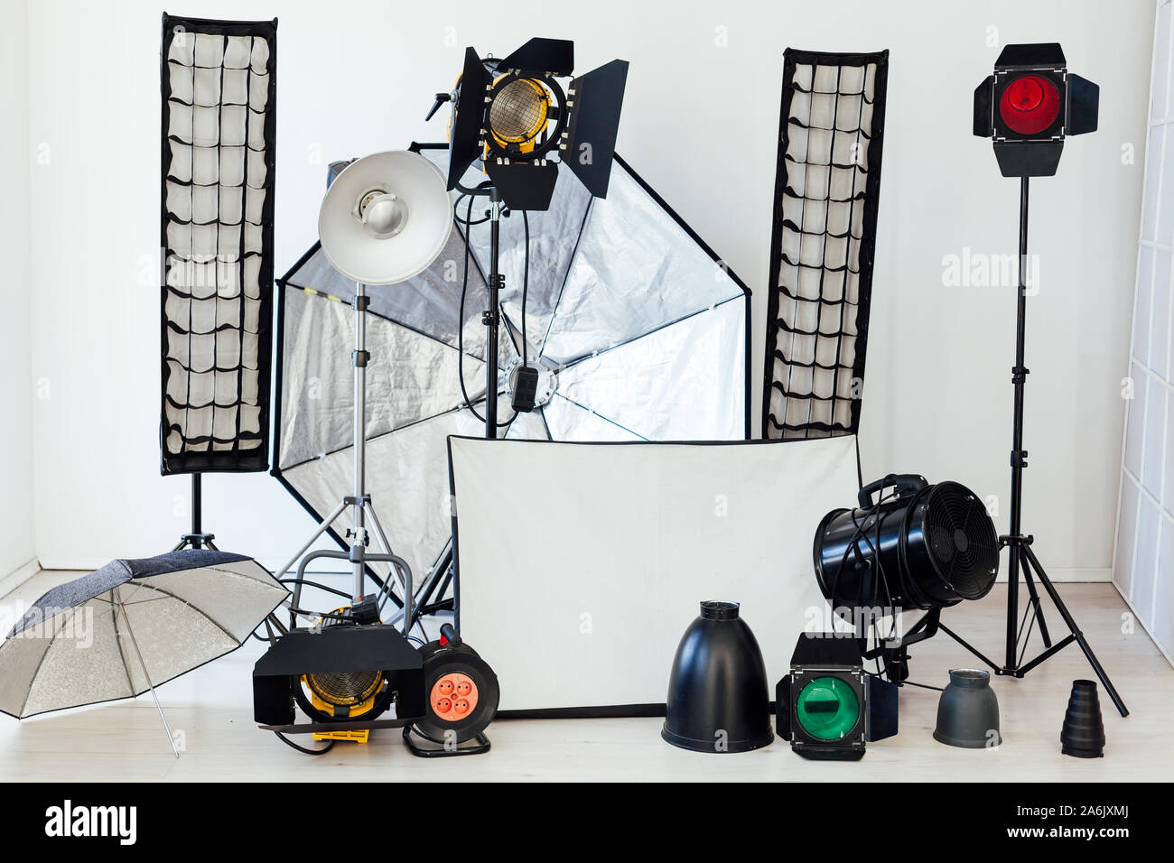 Photo studio equipment flash accessories photographer on a white ...