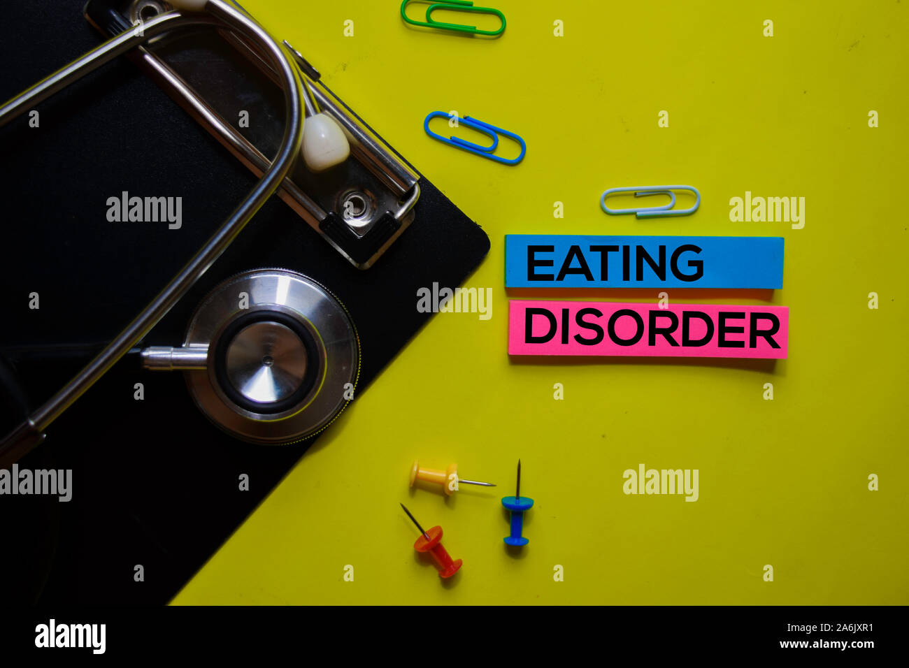 Eating Disorder on the sticky notes with Yellow background. Healthcare ...
