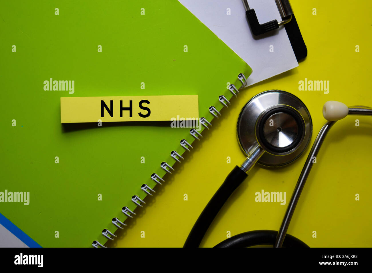 NHS on the sticky notes with Yellow background. Healthcare or Medical ...