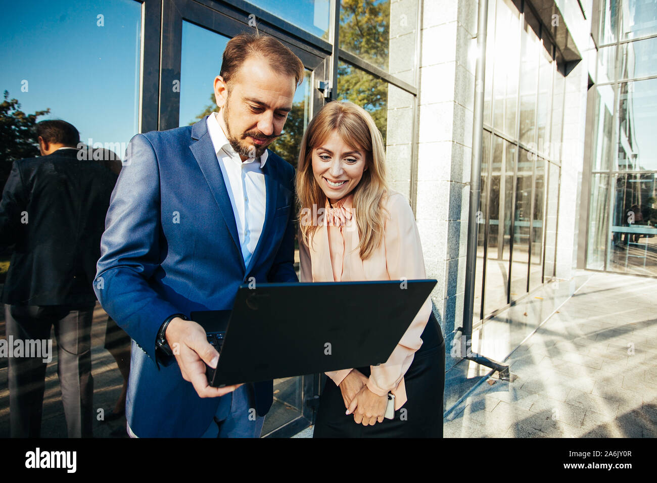 Two successful employees sitting hi-res stock photography and images ...