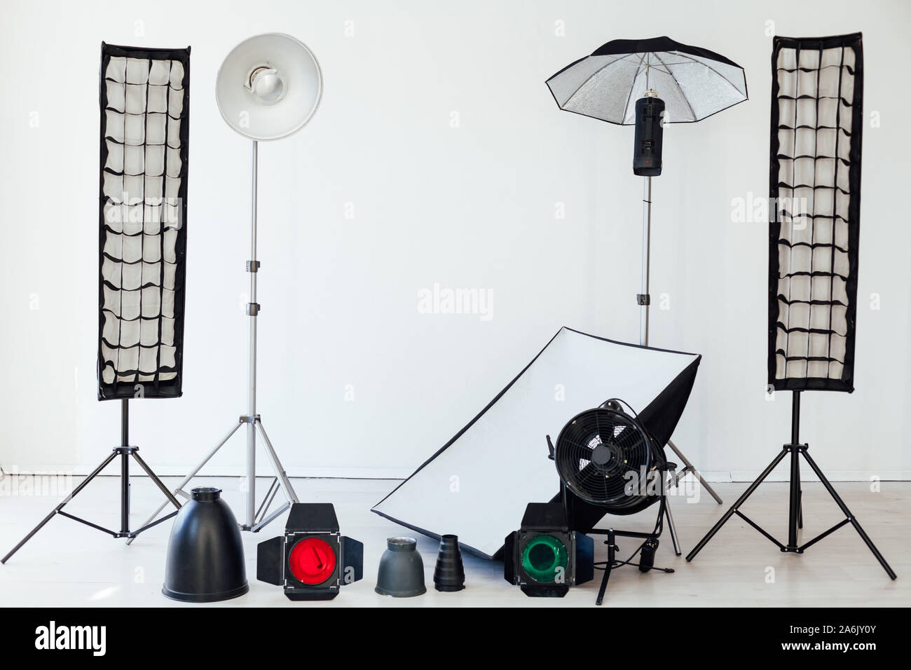 Photo studio equipment flash accessories photographer on a white ...
