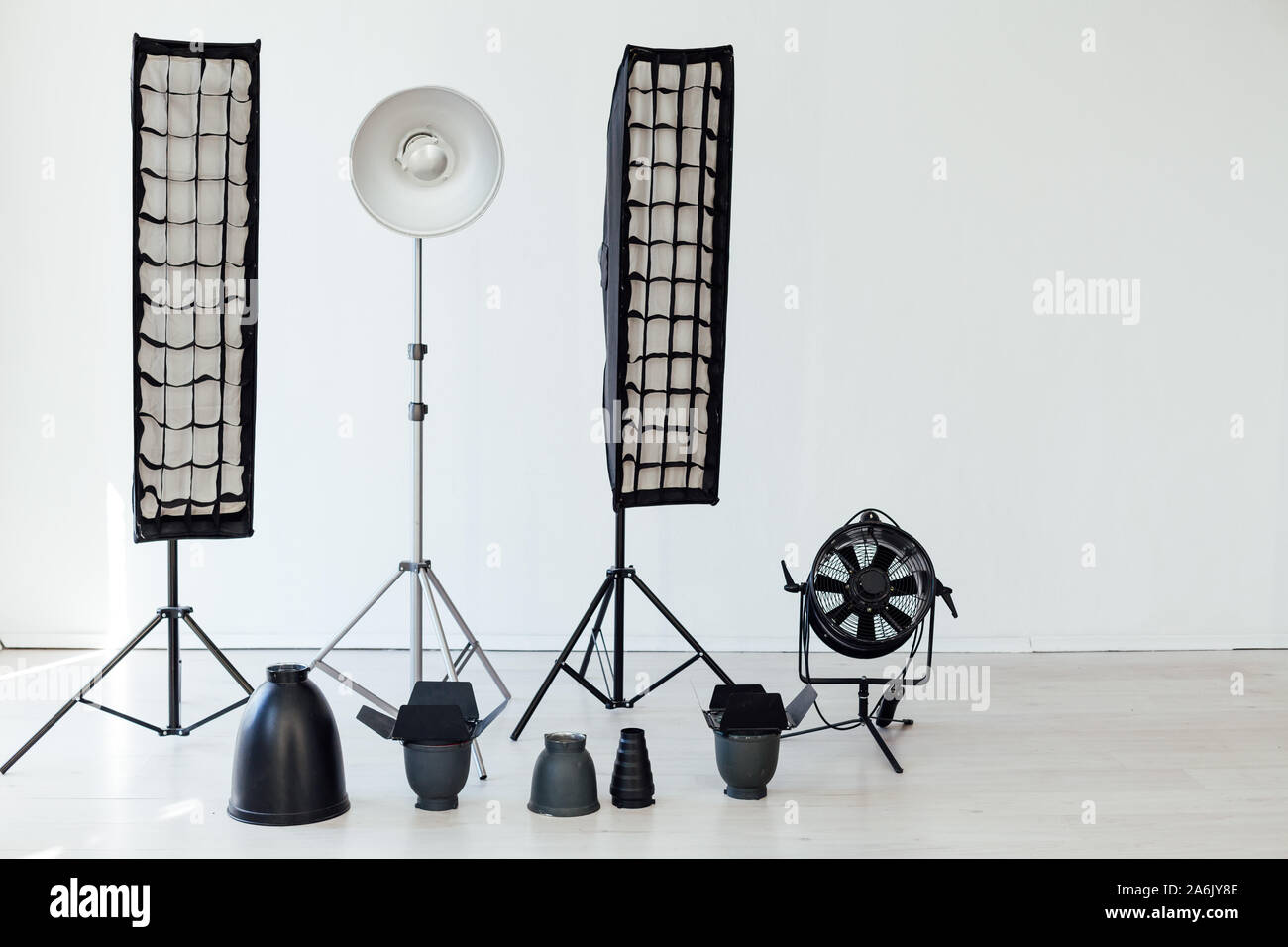 Photo studio equipment flash accessories photographer on a white ...