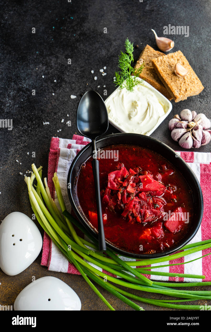 Traditional ukrainian beetroot soup borscht on stone background with ...