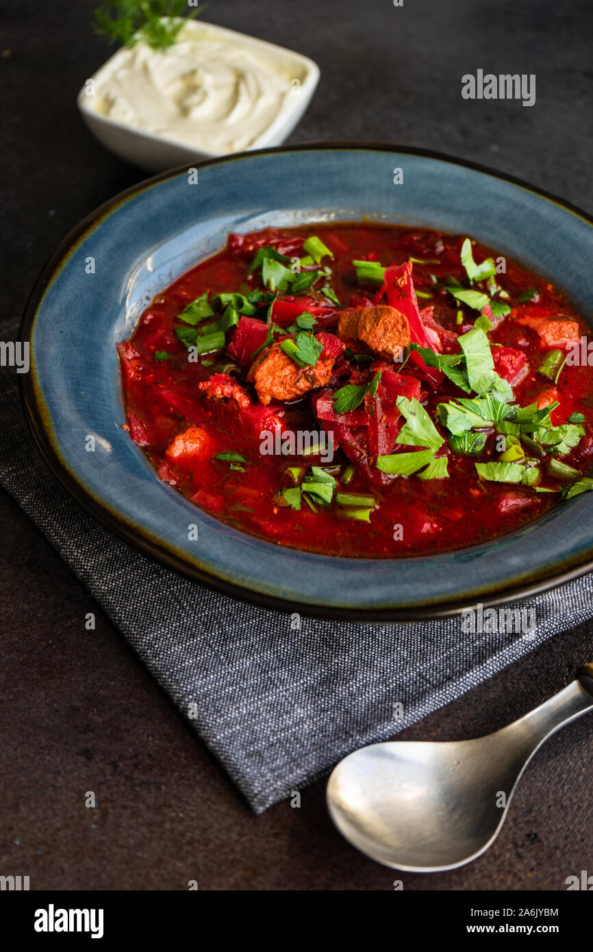 Traditional ukrainian beetroot soup borscht on stone background with ...