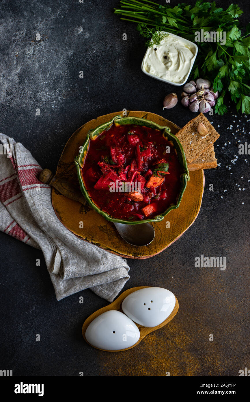 Traditional ukrainian beetroot soup borscht on stone background with ...