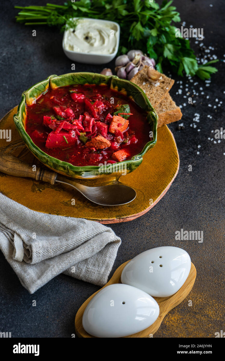 Traditional ukrainian beetroot soup borscht on stone background with ...