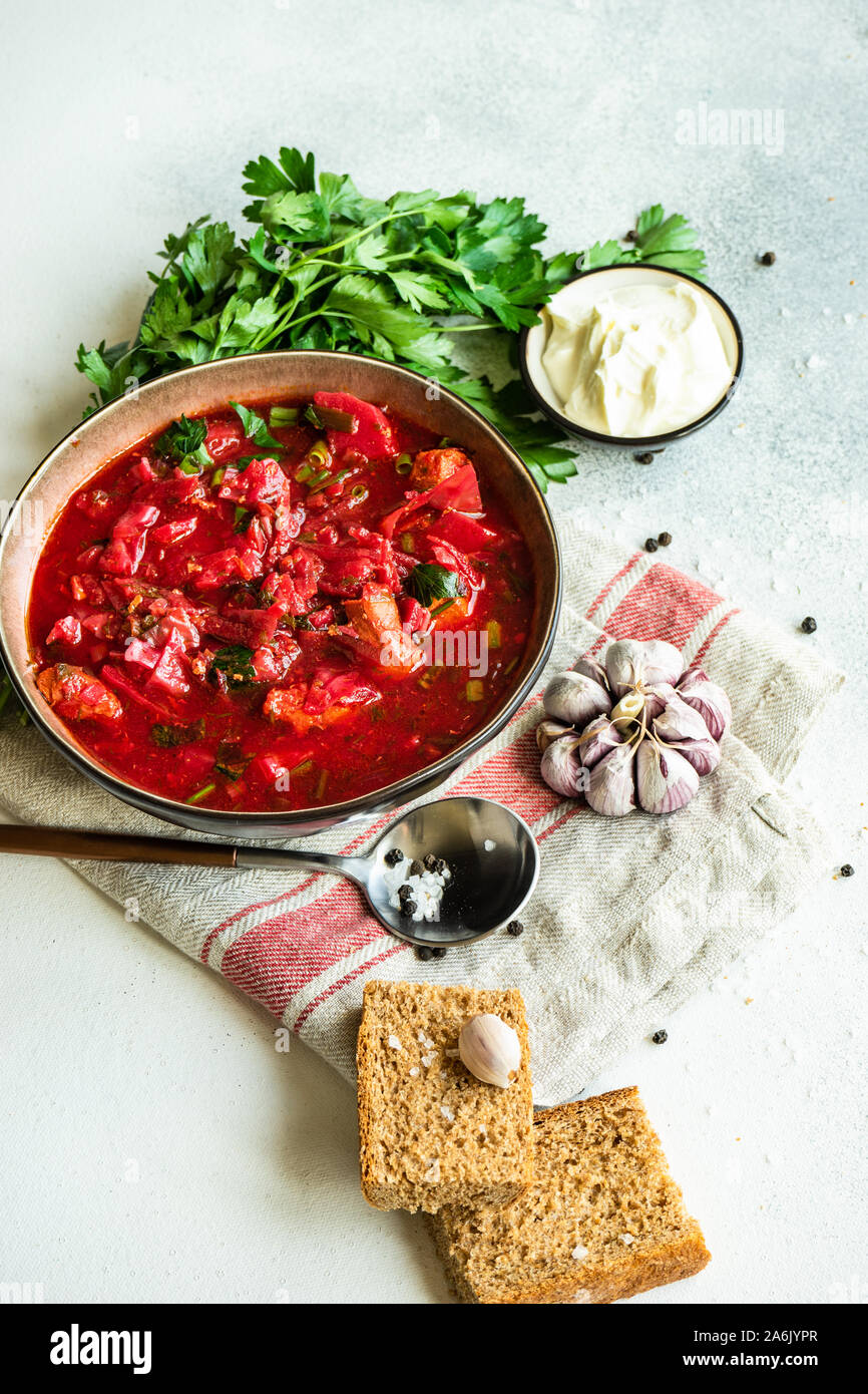 Traditional ukrainian beetroot soup borscht on stone background with ...