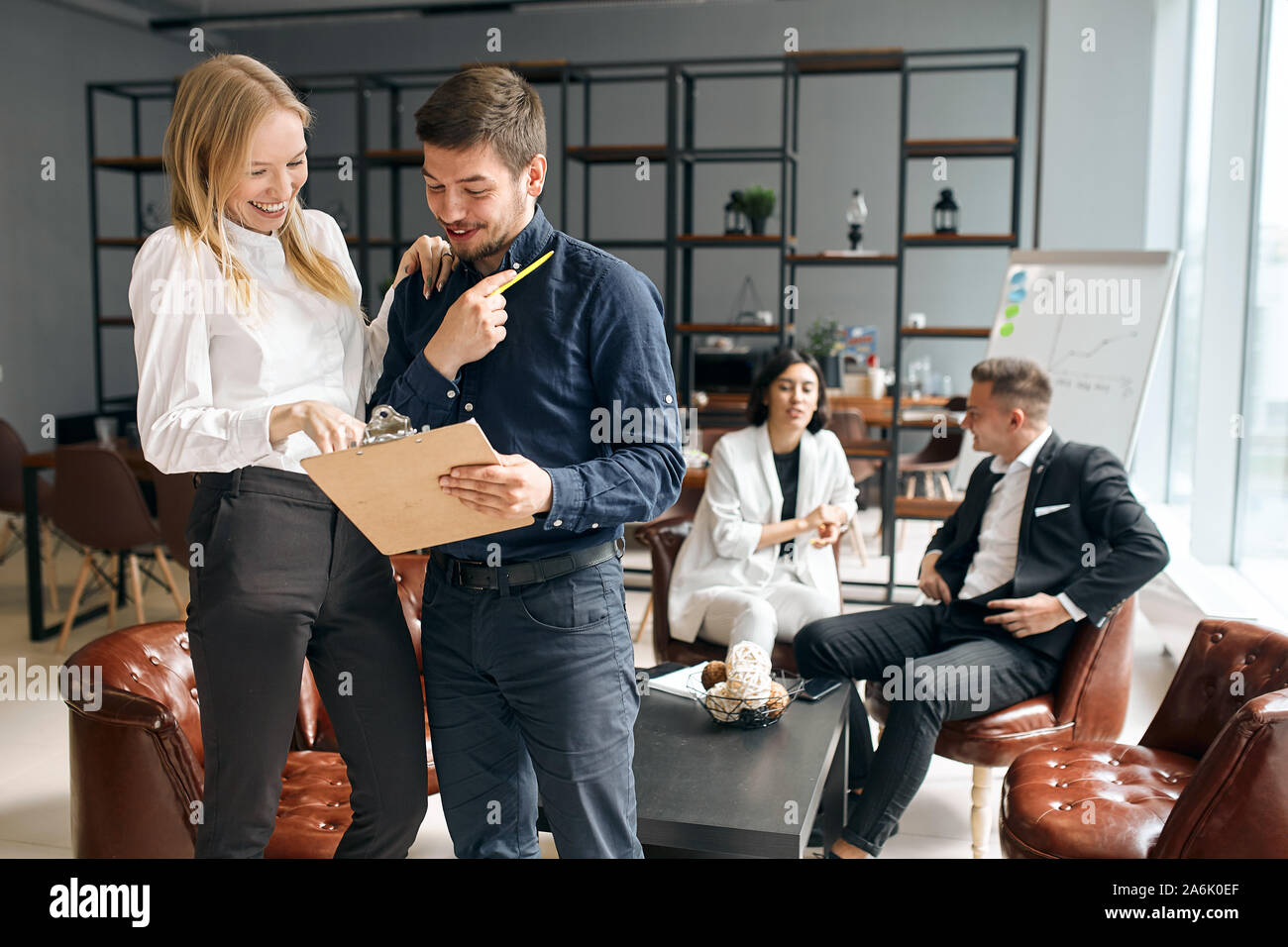 awesome business people having fun while working in the office room ...