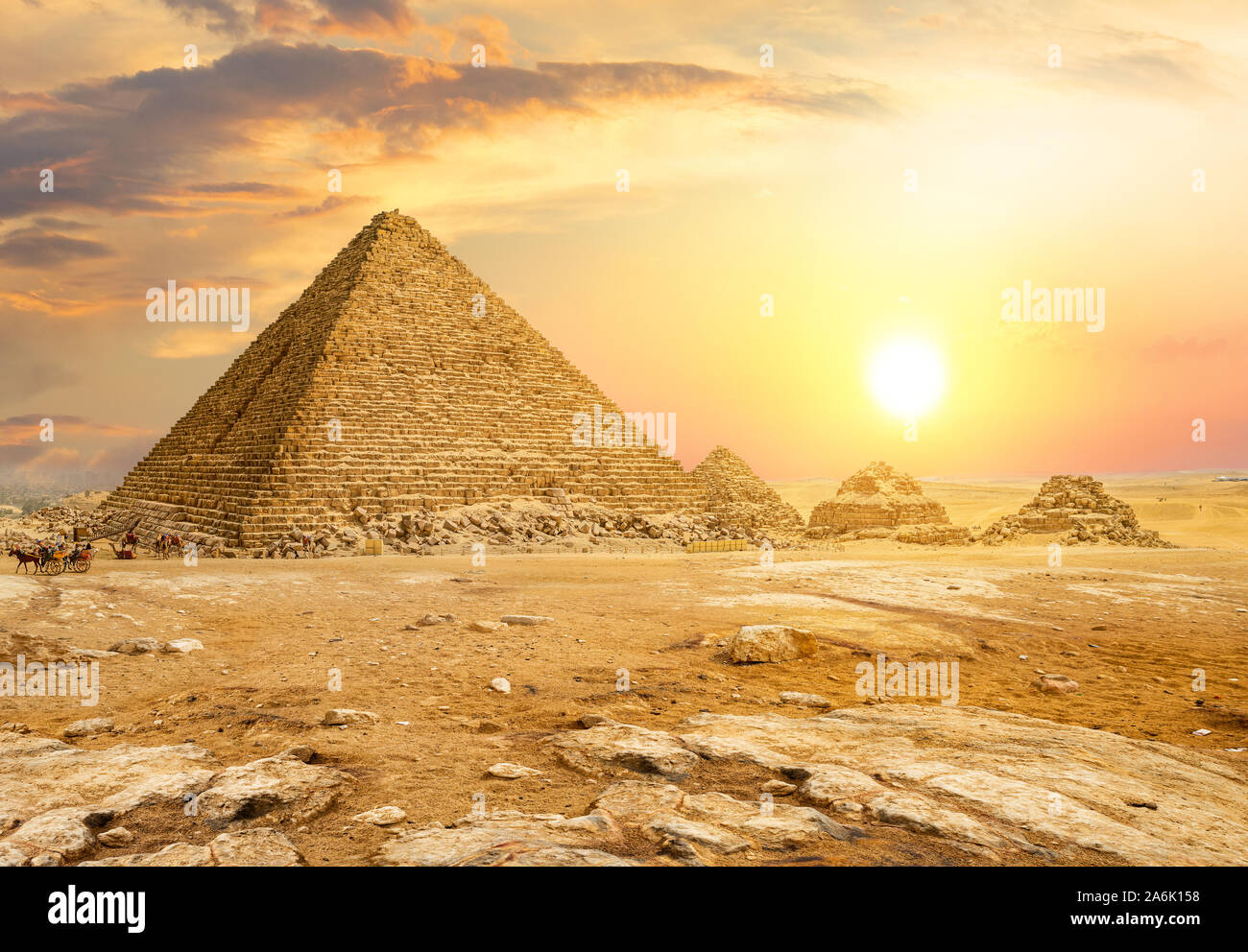 Egyptian pyramid in sand desert and clear sky Stock Photo - Alamy