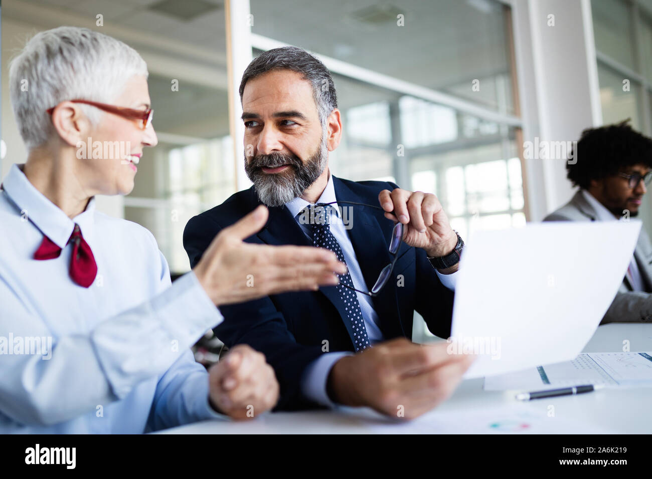 Successful team leader and business owner leading informal in-house ...