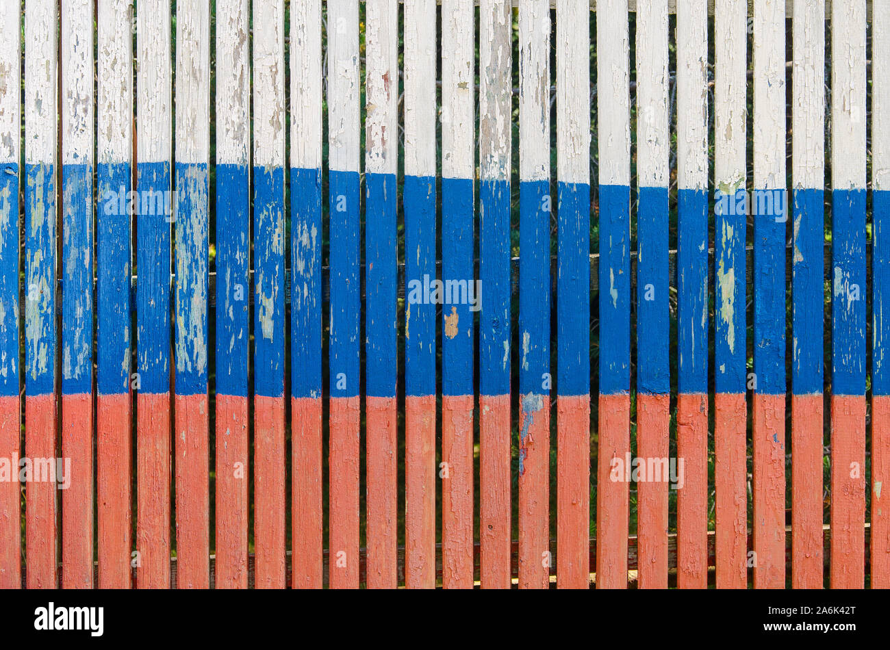 Wooden slats painted in the color of the Russian flag. Russian flag ...