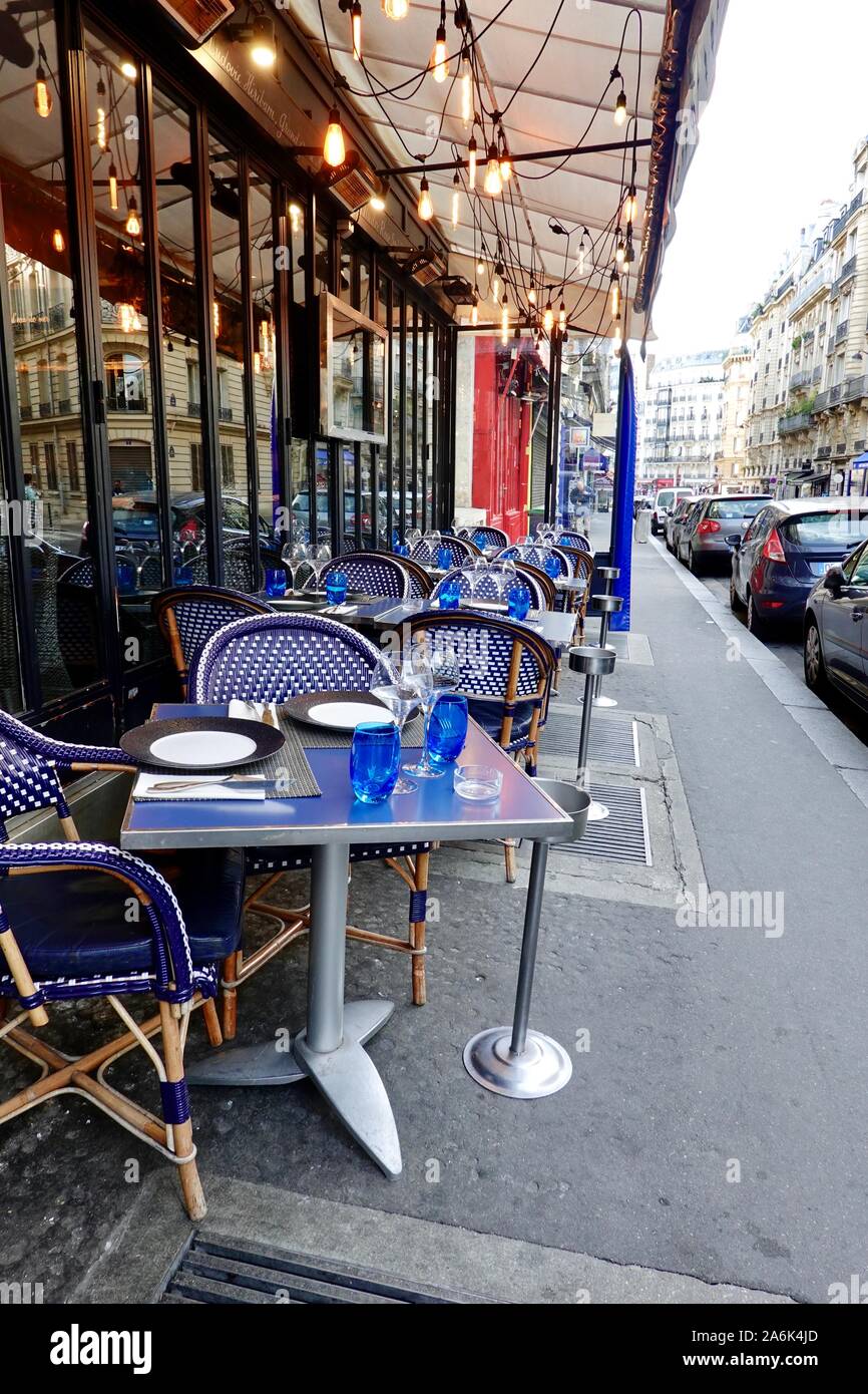 Outdoor, empty sidewalk cafe, seafood restaurant, before opening for ...