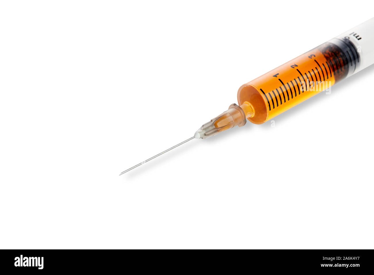 Syringe filled with orange liquid on isolated white background Stock ...