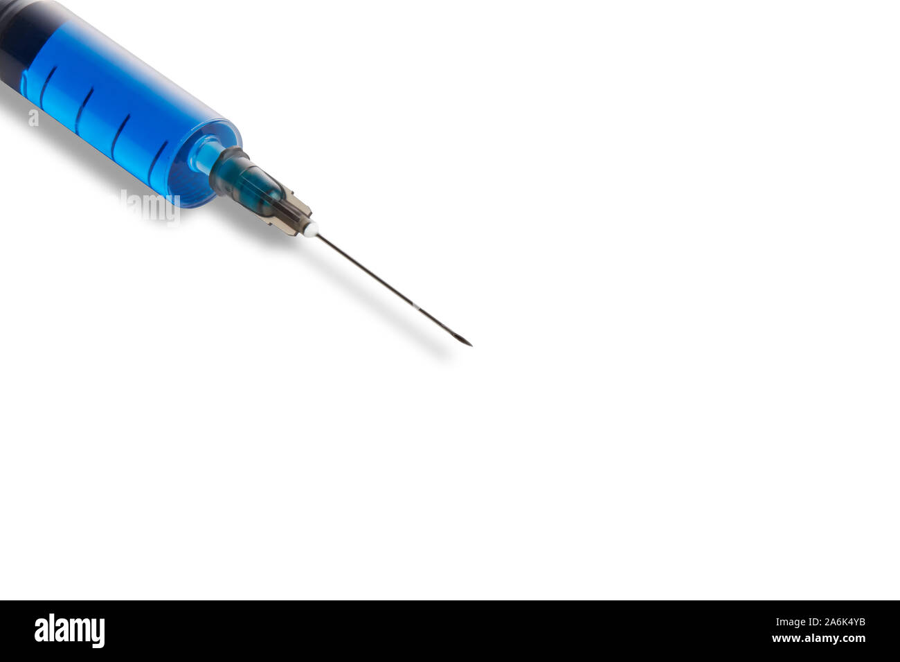 Syringe filled with blue liquid against isolated white background Stock ...