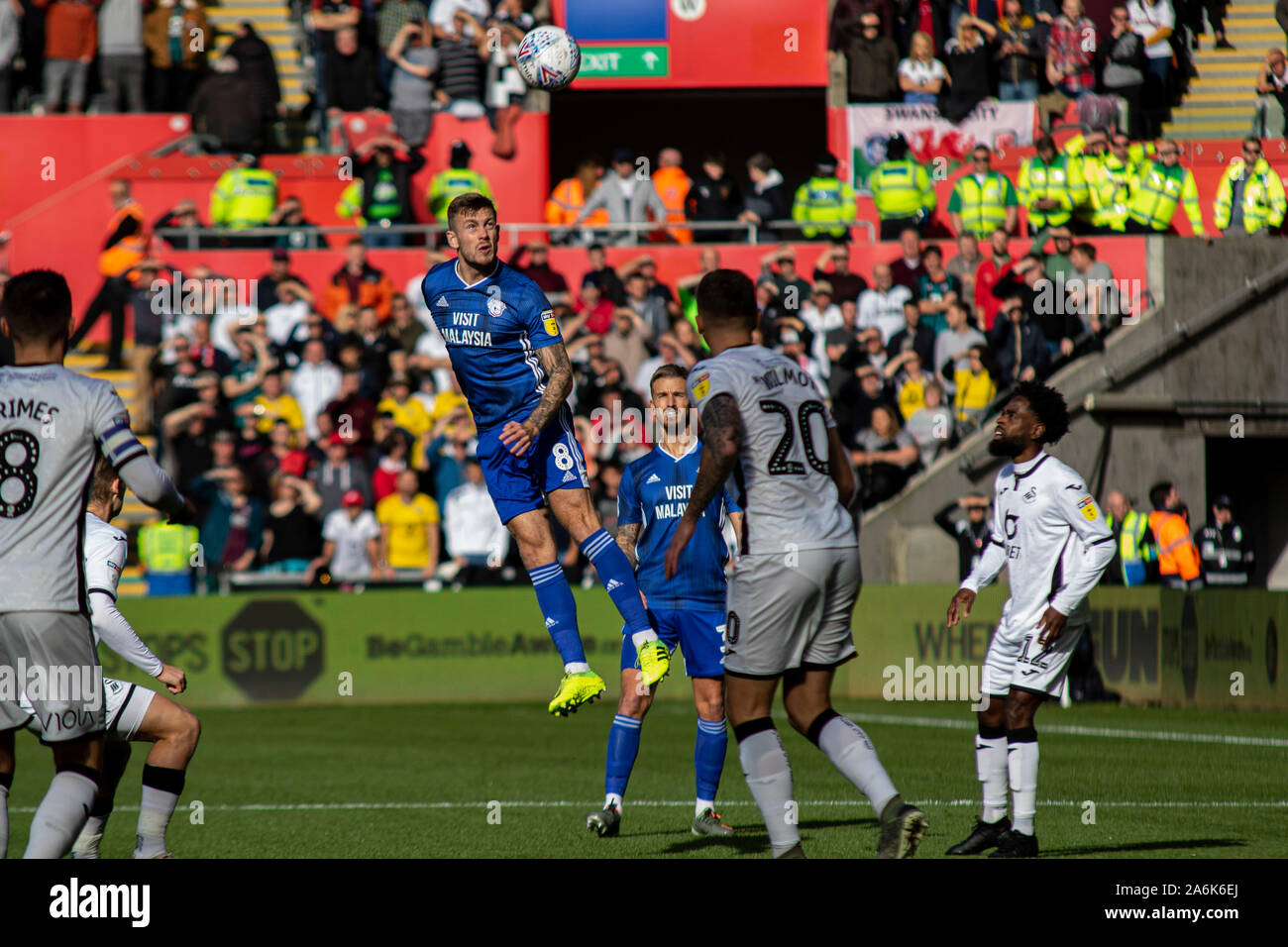 Swansea, UK. 27th Oct, 2019. Joe Ralls of Cardiff City wins a header ...