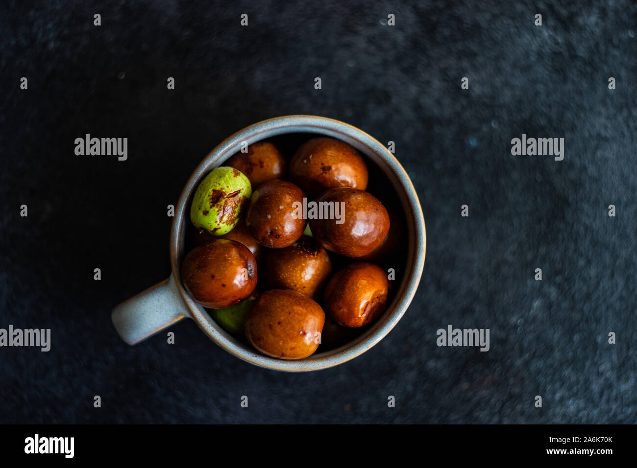 Traditional georgian fruit jujube on dark stone background with copy ...