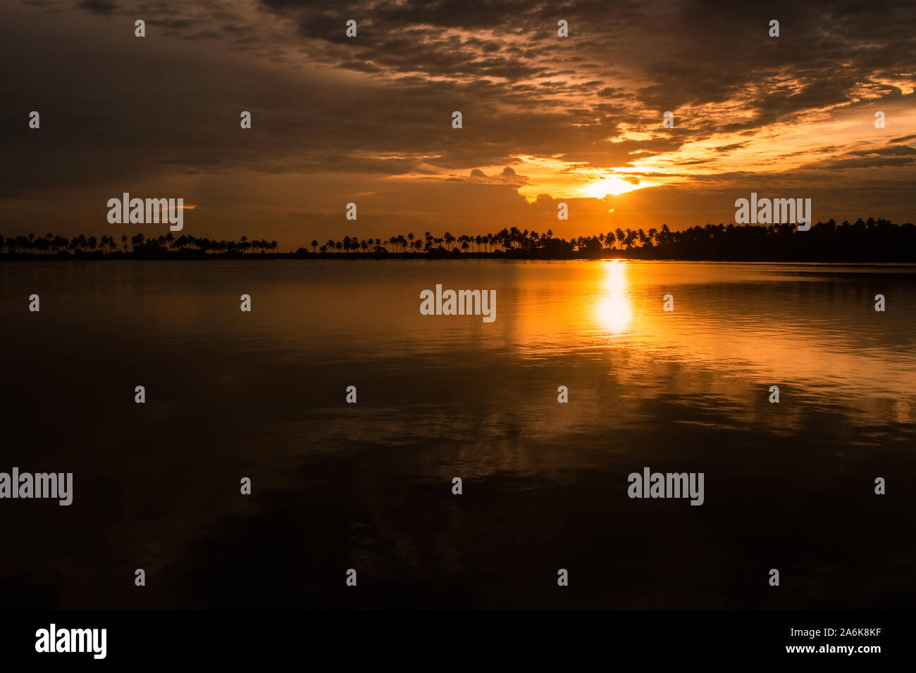 Sunset at Edava backwaters in Kerala Stock Photo - Alamy