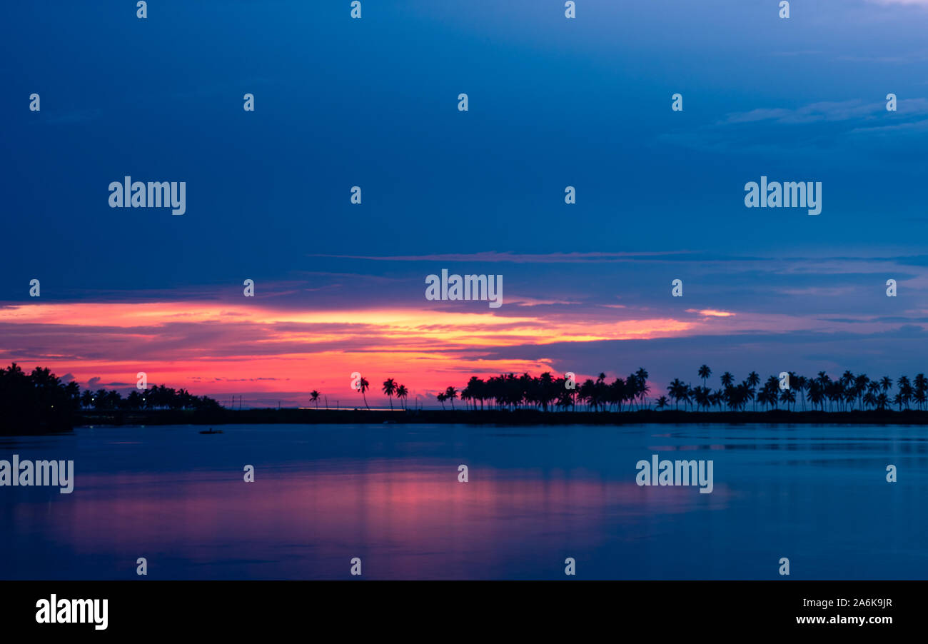 Sunset at Edava backwaters in Kerala Stock Photo - Alamy