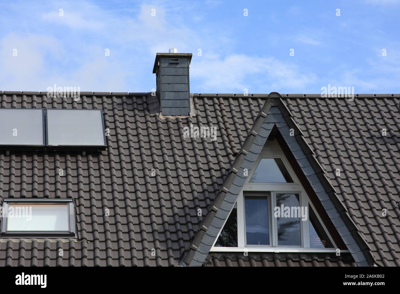 House with roof window Stock Photo - Alamy